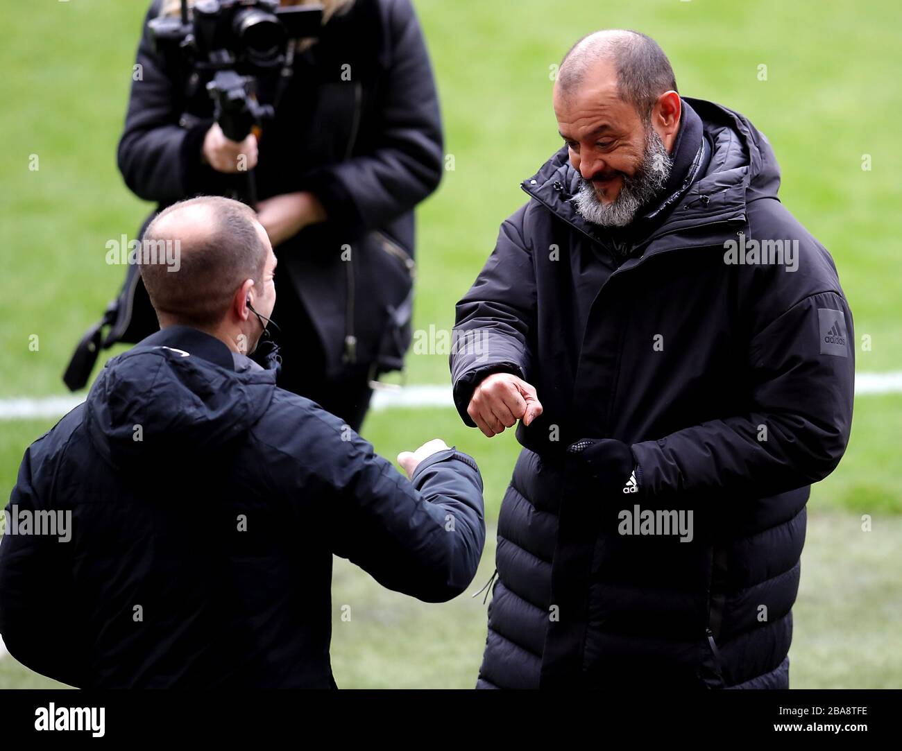 Wolverhampton Wanderers manager Nuno Espirito Santo (right) fist bumps ...