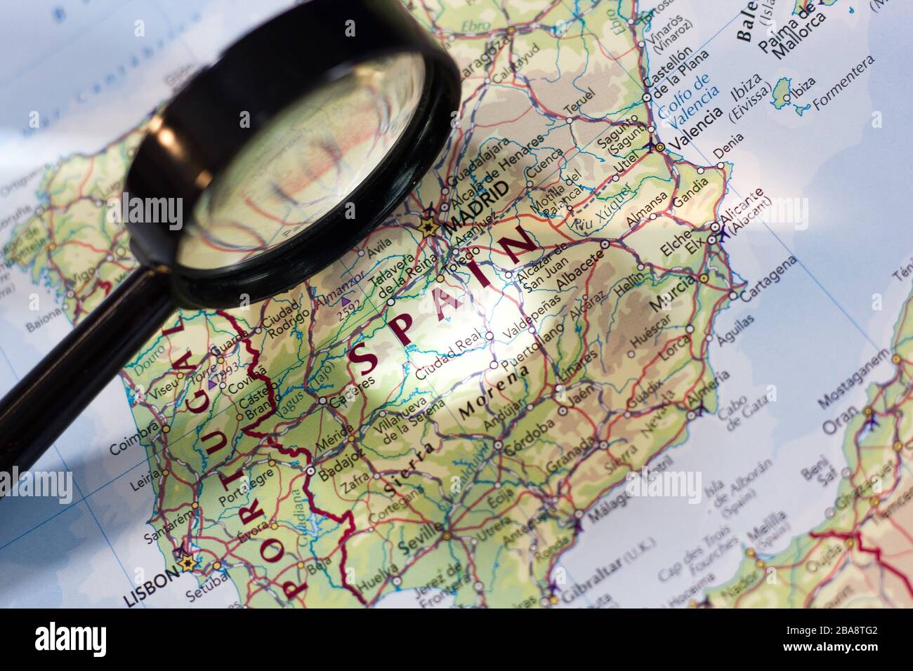 Spain on the map of the world or atlas Stock Photo - Alamy