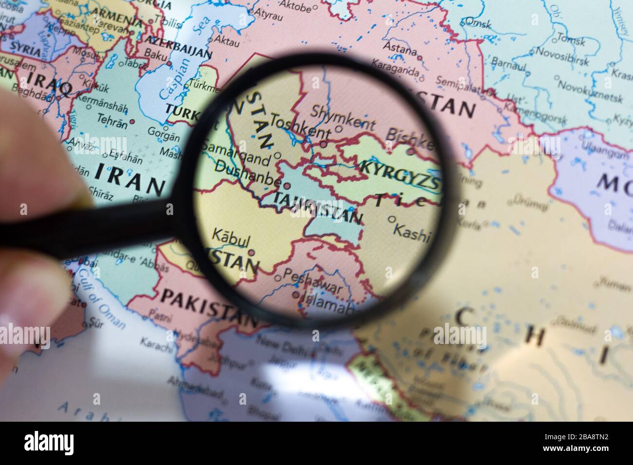 Tajikistan on the map of the world or atlas Stock Photo - Alamy