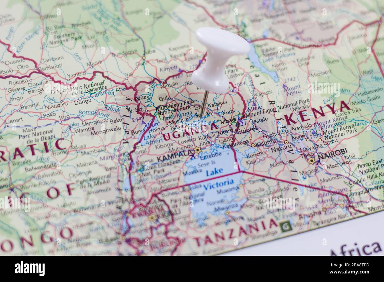 Uganda on the map of the world or atlas Stock Photo - Alamy