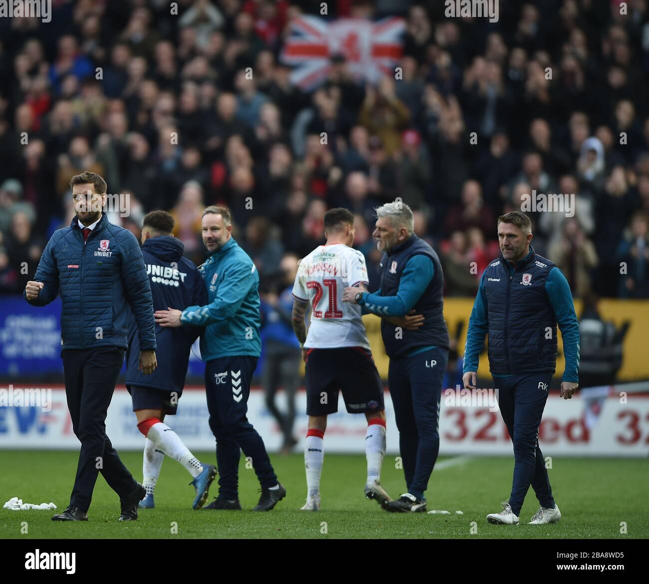 Middlesbrough manager Jonathan Woodgate (left) and staff celebrate at ...