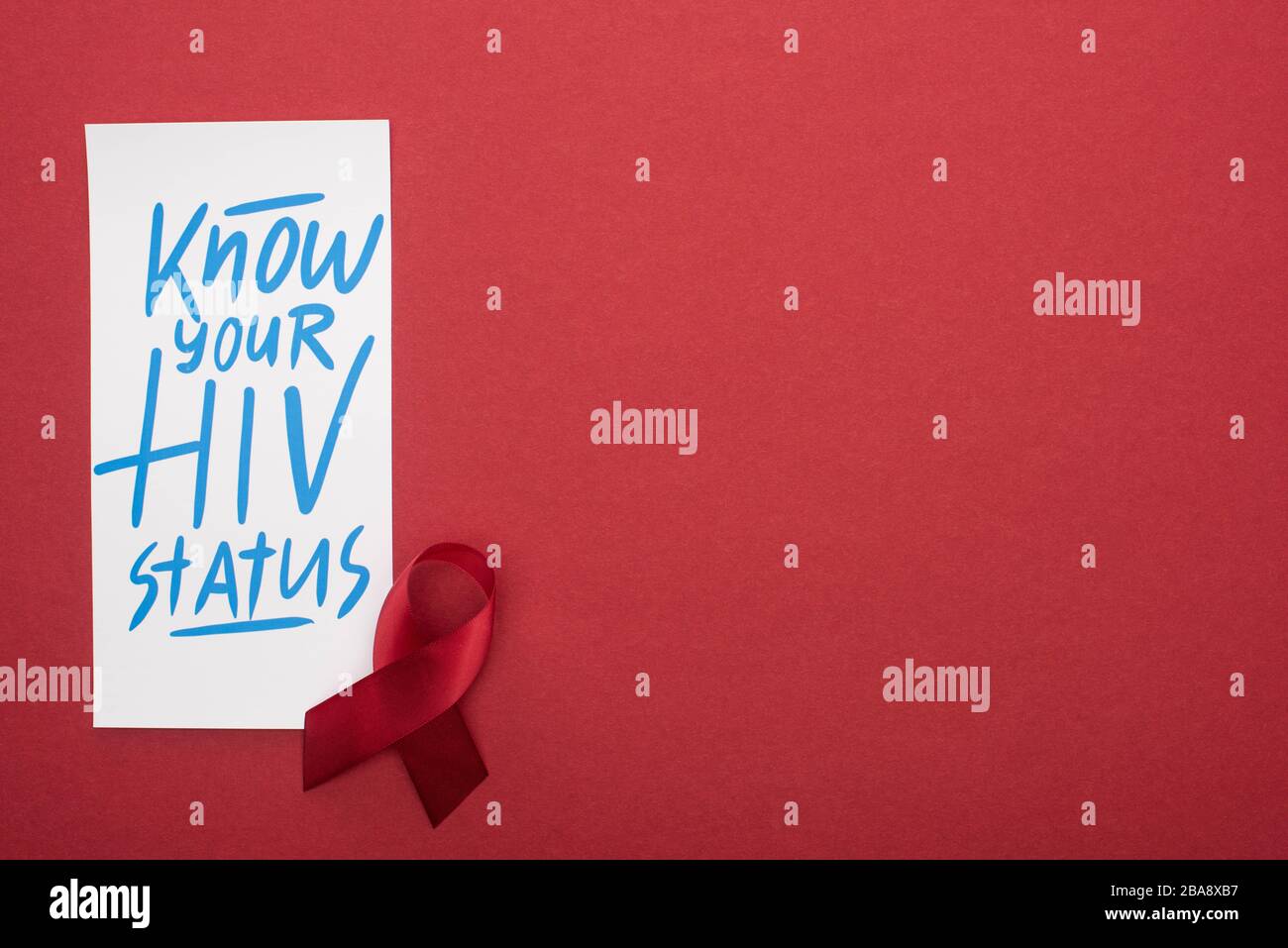 top view of card with know your HIV status lettering and awareness ...
