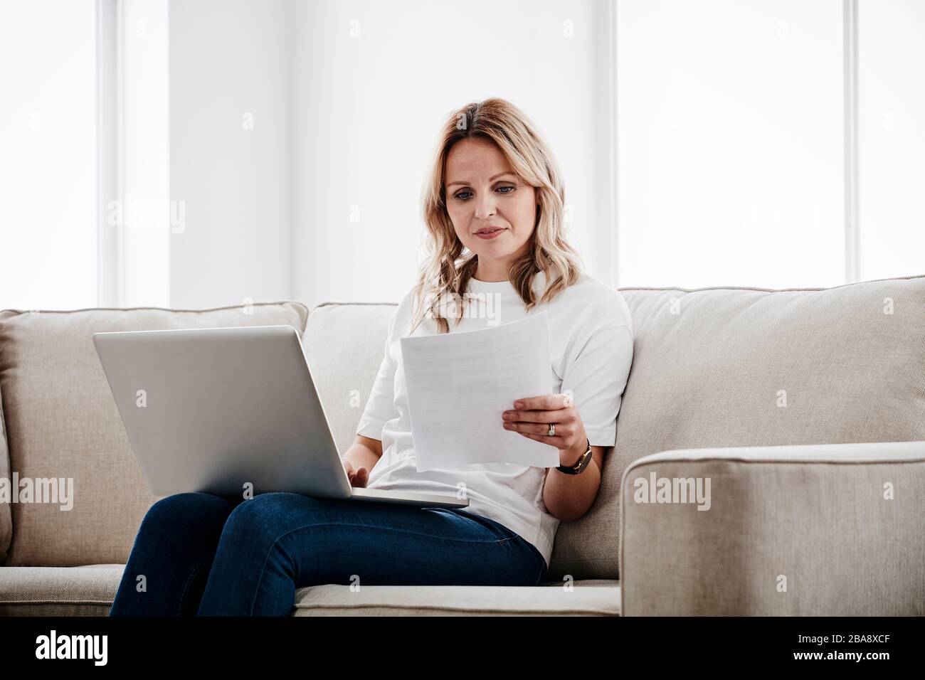 Woman Bank Statement Worried High Resolution Stock Photography and ...
