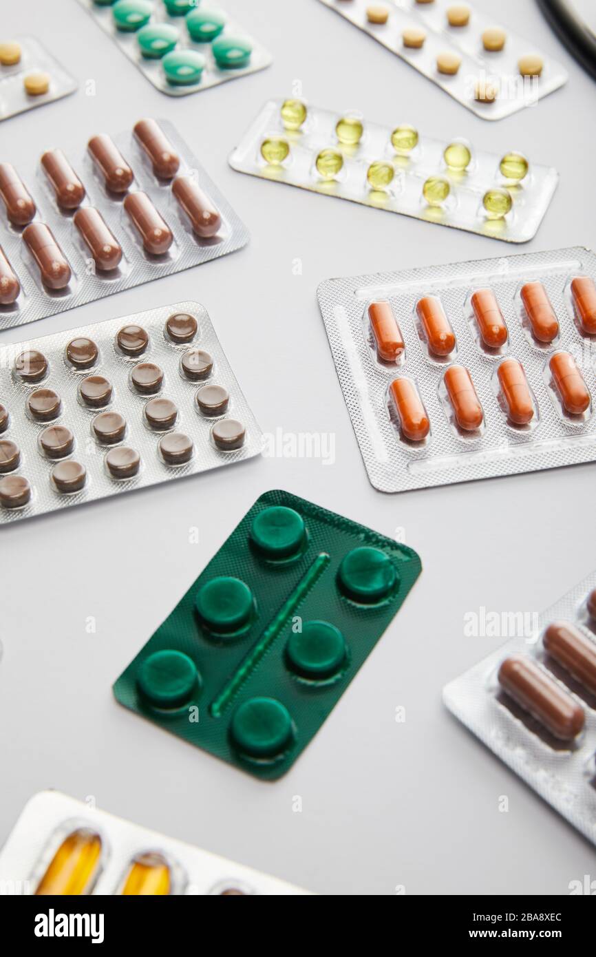 Selective focus of different medicines on white Stock Photo - Alamy