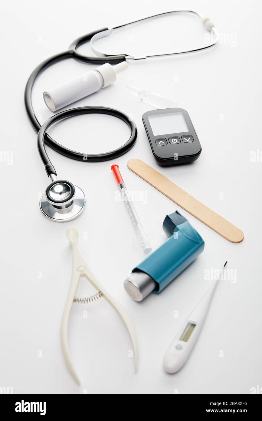 High angle view of medical objects on white Stock Photo - Alamy