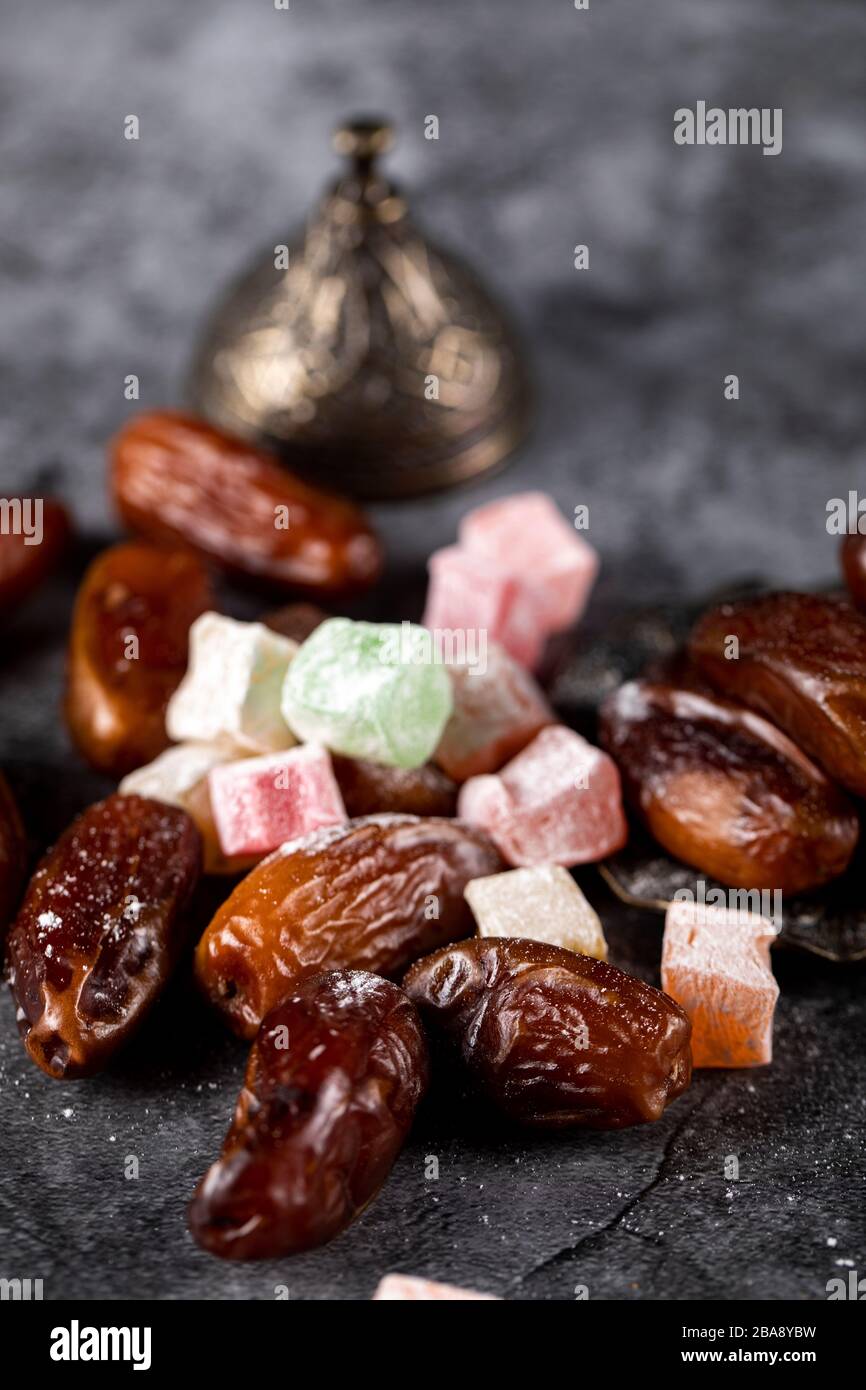 Turkish lokum with oriental dates on a piece of marble Stock Photo - Alamy