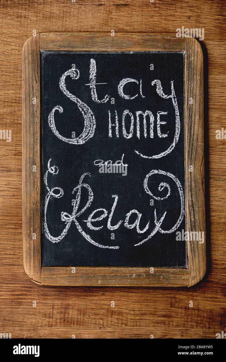 Stay home and relax lettering Stock Photo - Alamy