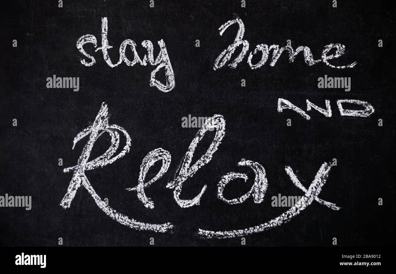 Stay home and relax lettering Stock Photo - Alamy