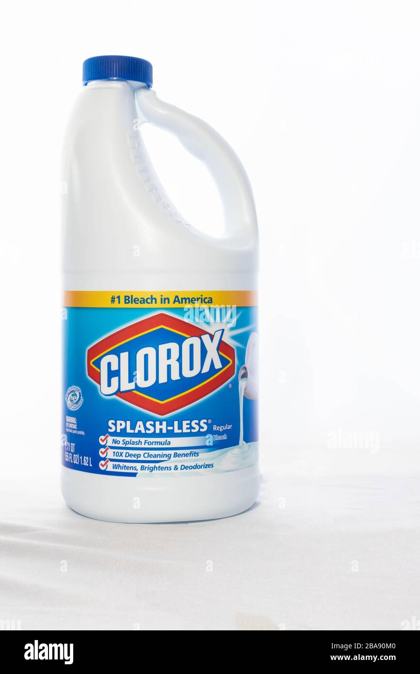 Bleach container on white fabric against a white background Stock Photo ...