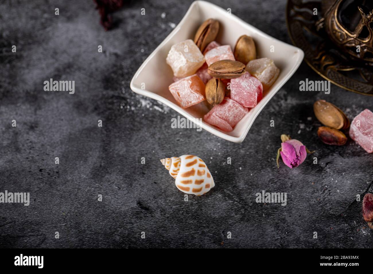 Turkish lokum and nuts in a white saucer Stock Photo - Alamy