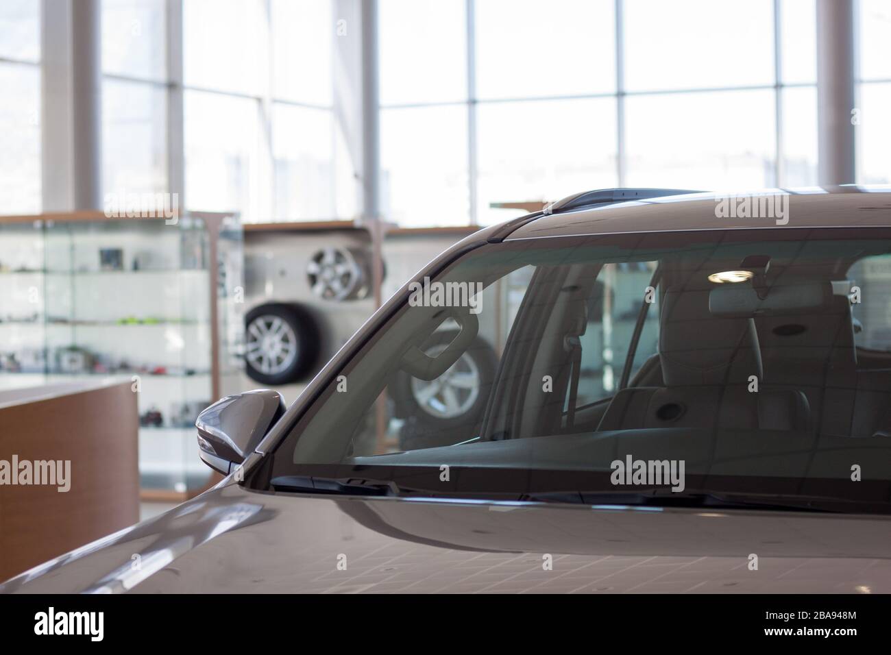 Car showroom. Part of new vehicle in dealership. Modern transportation ...