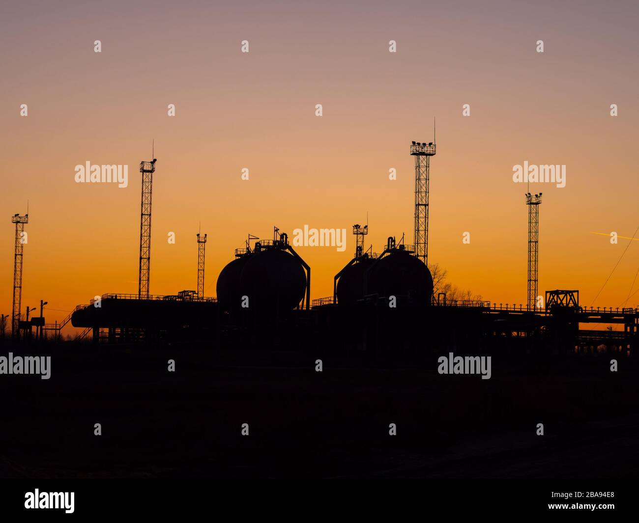 Oil refinery night Stock Photo - Alamy