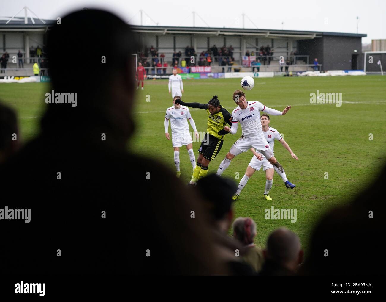 Fans watch match action between AFC Fylde and Aldershot Town Stock ...