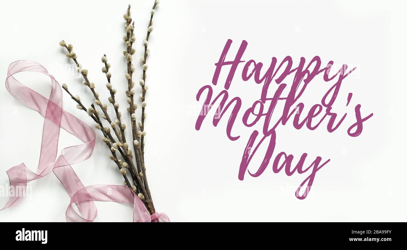 Happy Mothers Day words. Beautiful and tender bouquet of flowers in the ...
