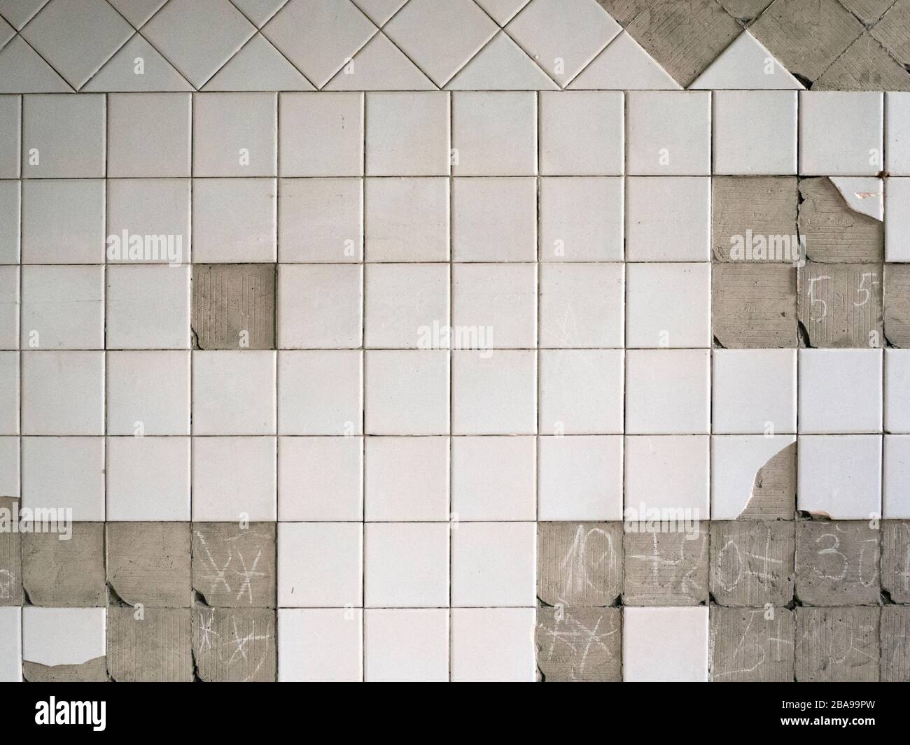 Old tiles and textures on decaying house wall Stock Photo - Alamy