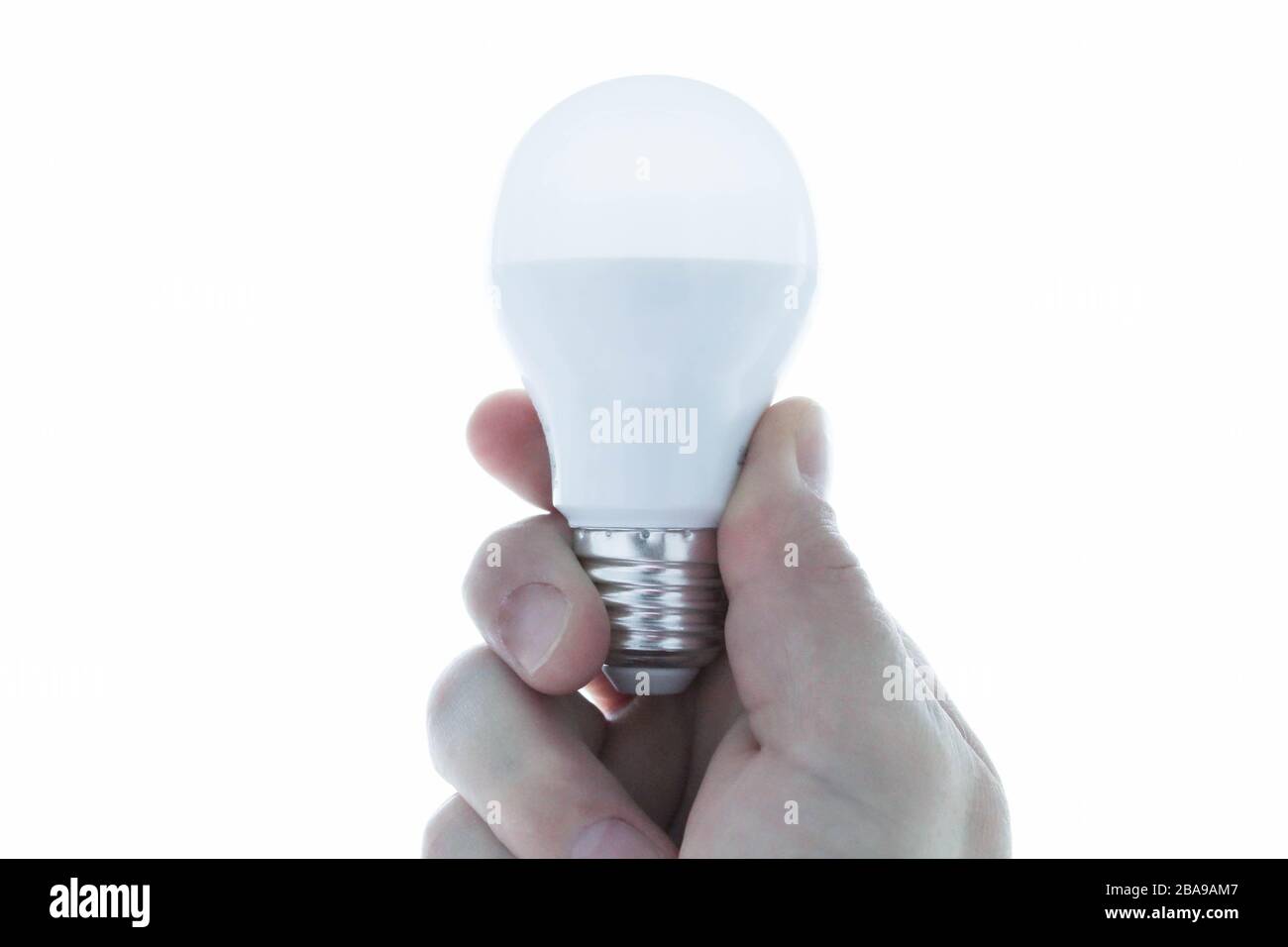 Female hand holding a bulb hi-res stock photography and images - Alamy