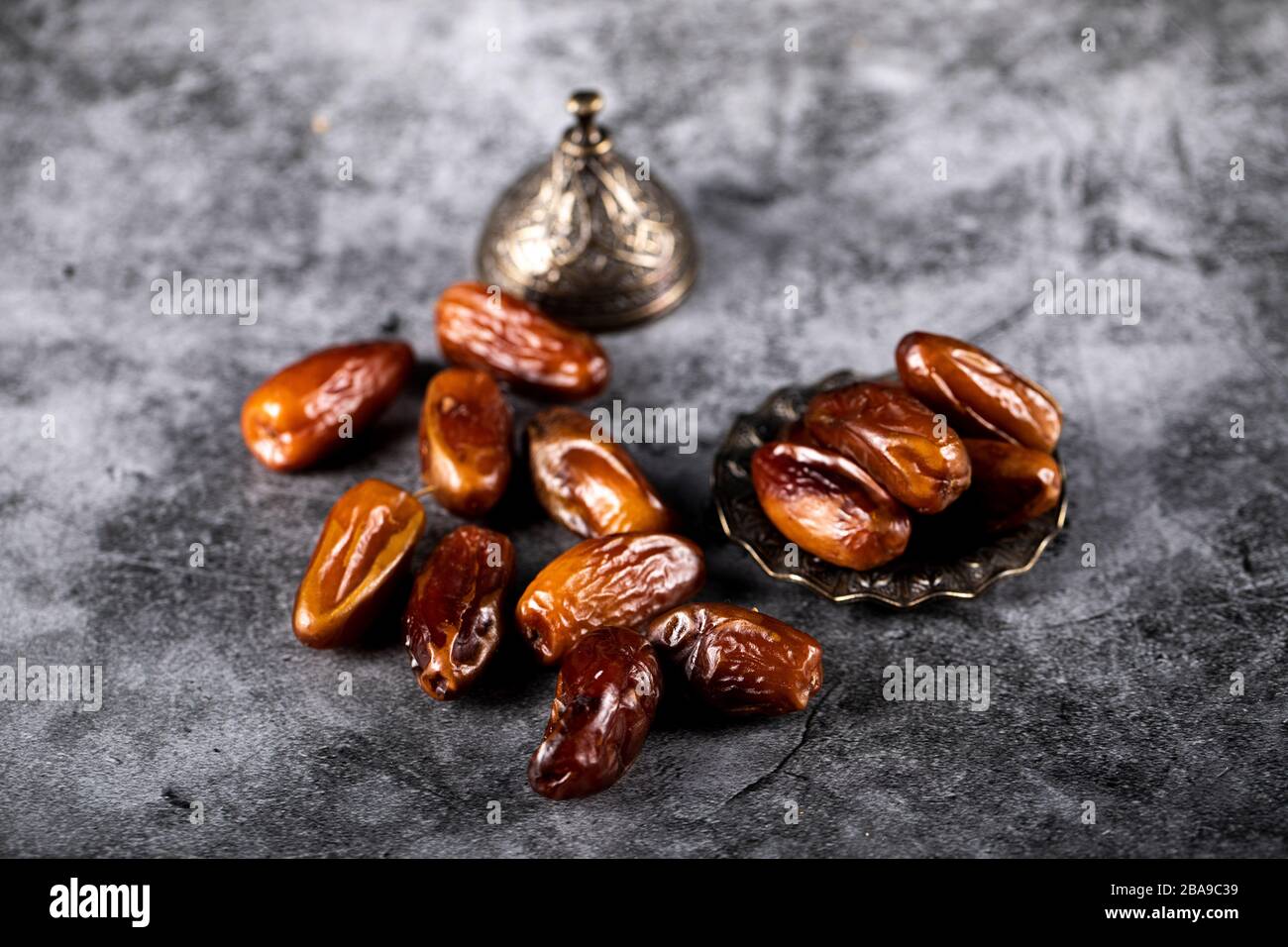 Arabic delight dates on a dark marble Stock Photo - Alamy