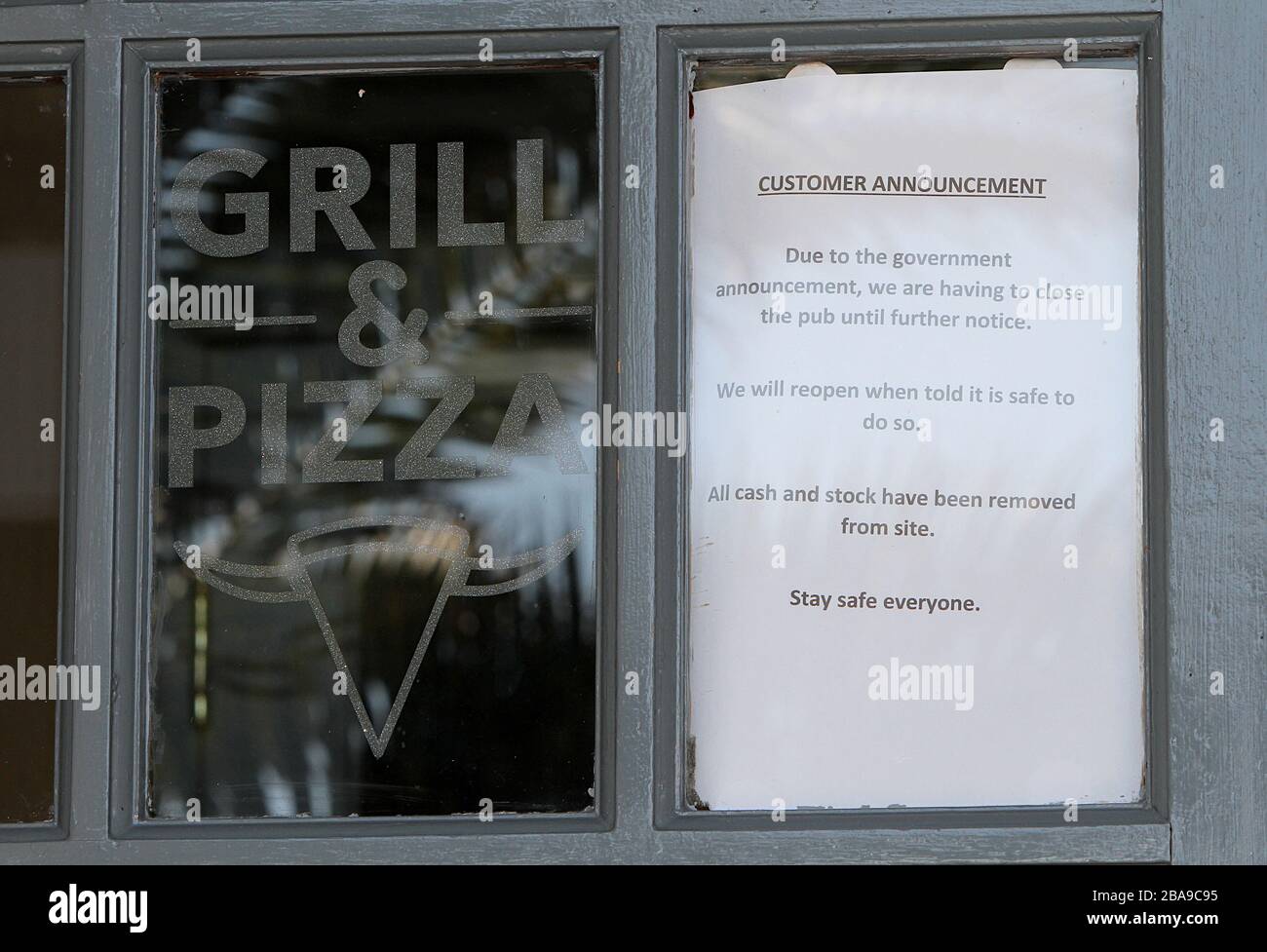Paignton, Devon, England: Signs in shop windows around the town warning ...