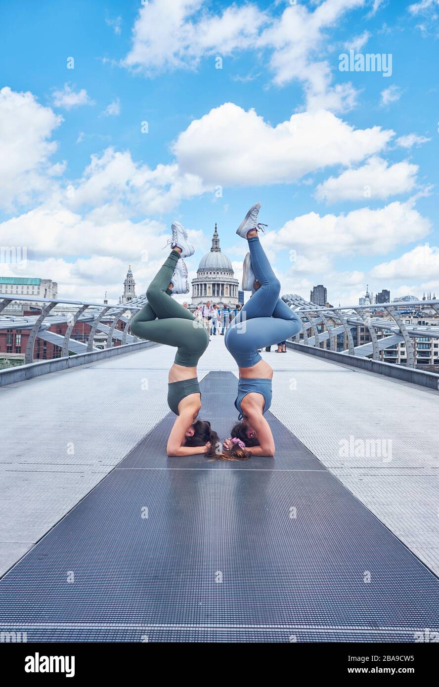 yoga pose on bridge on London Stock Photo - Alamy