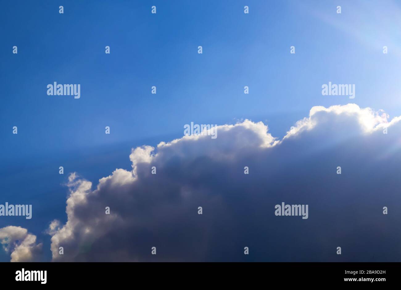 Beautiful sunlight beams through a stunning cloudscape in the sky Stock ...
