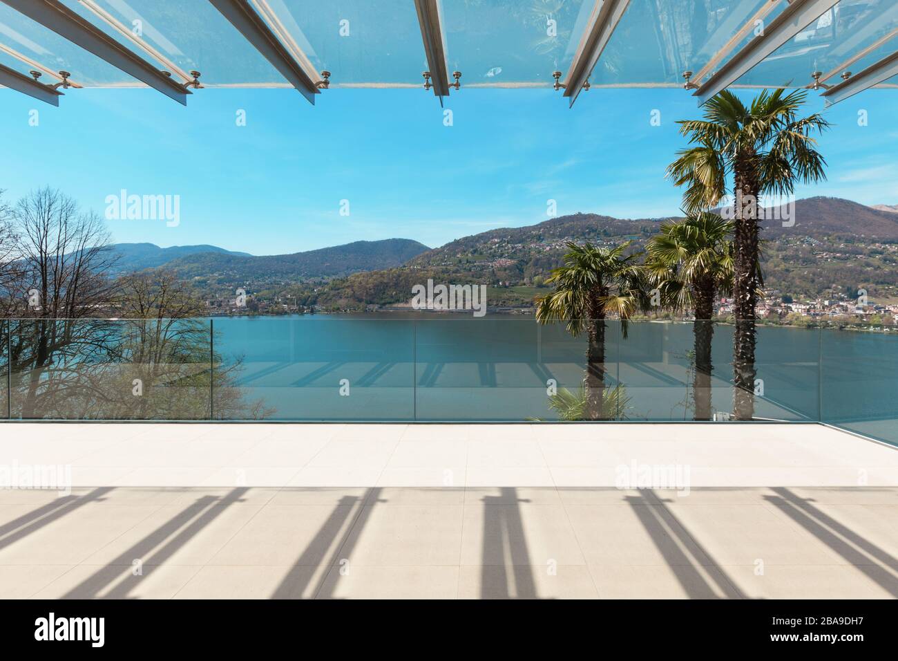 architecture, modern house, beautiful veranda overlooking the lake ...