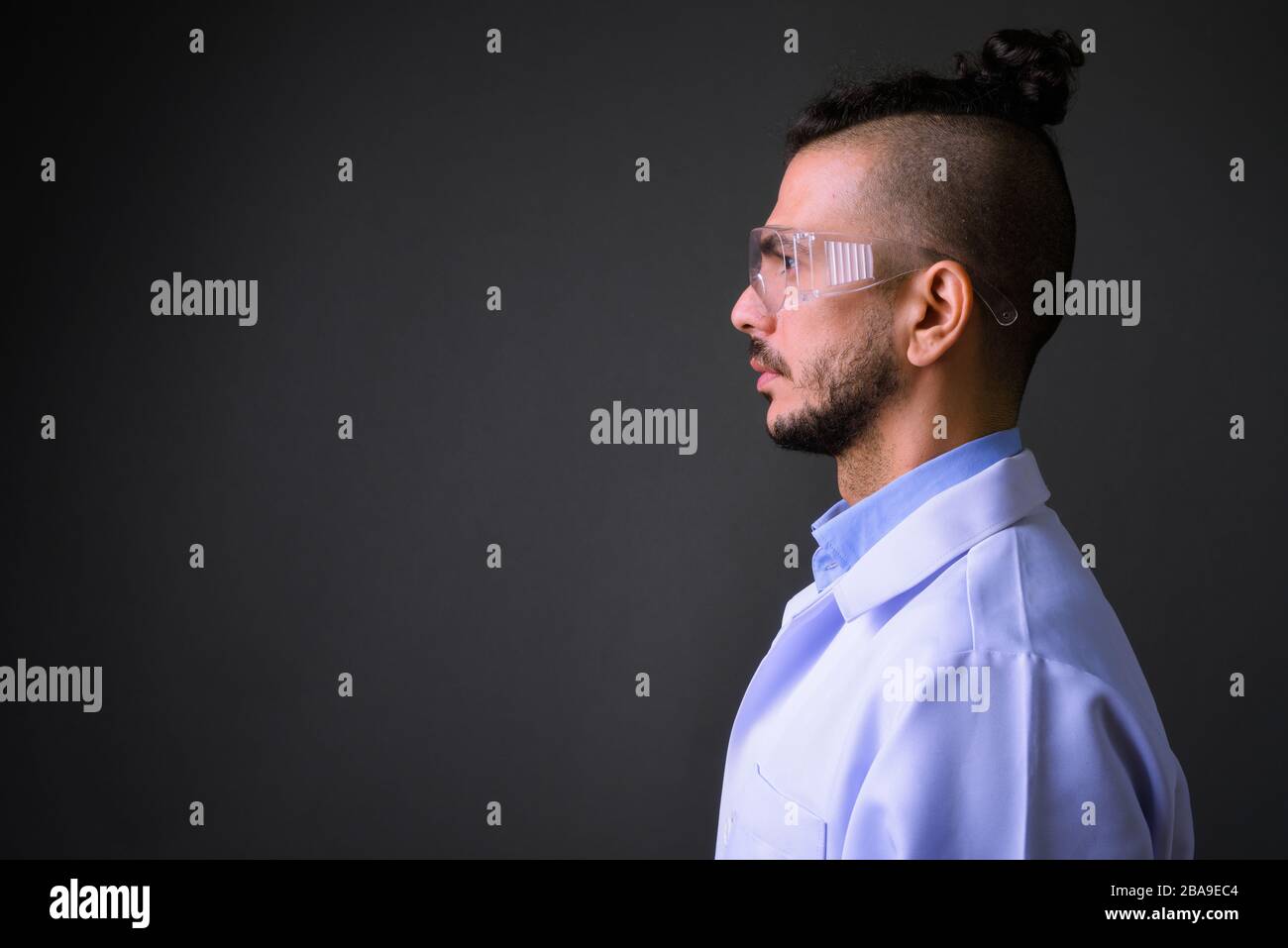 Closeup profile view of handsome bearded Turkish man doctor as ...