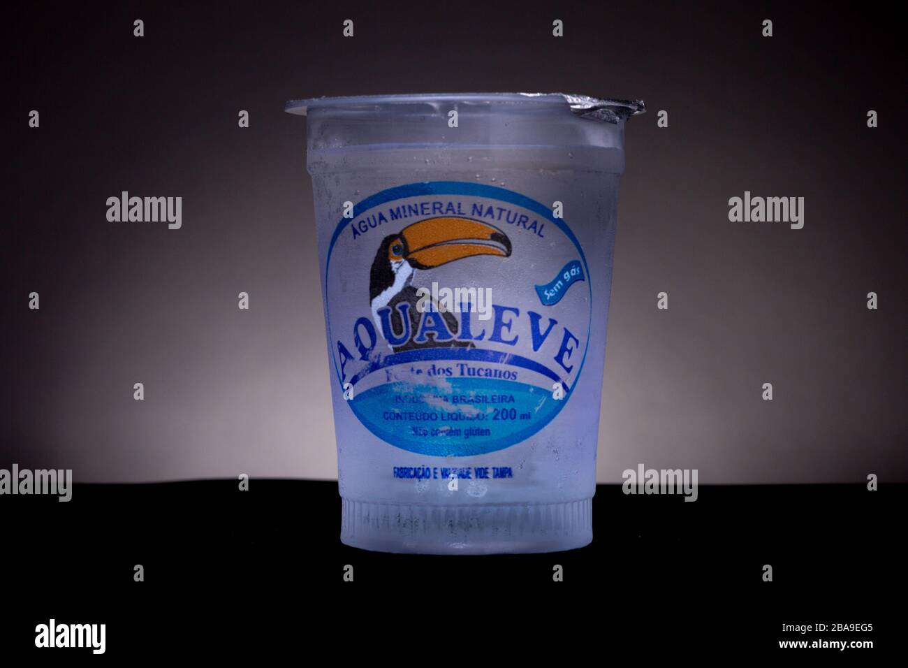 Self-contained single plastic cup of water as dispensable hydration ...