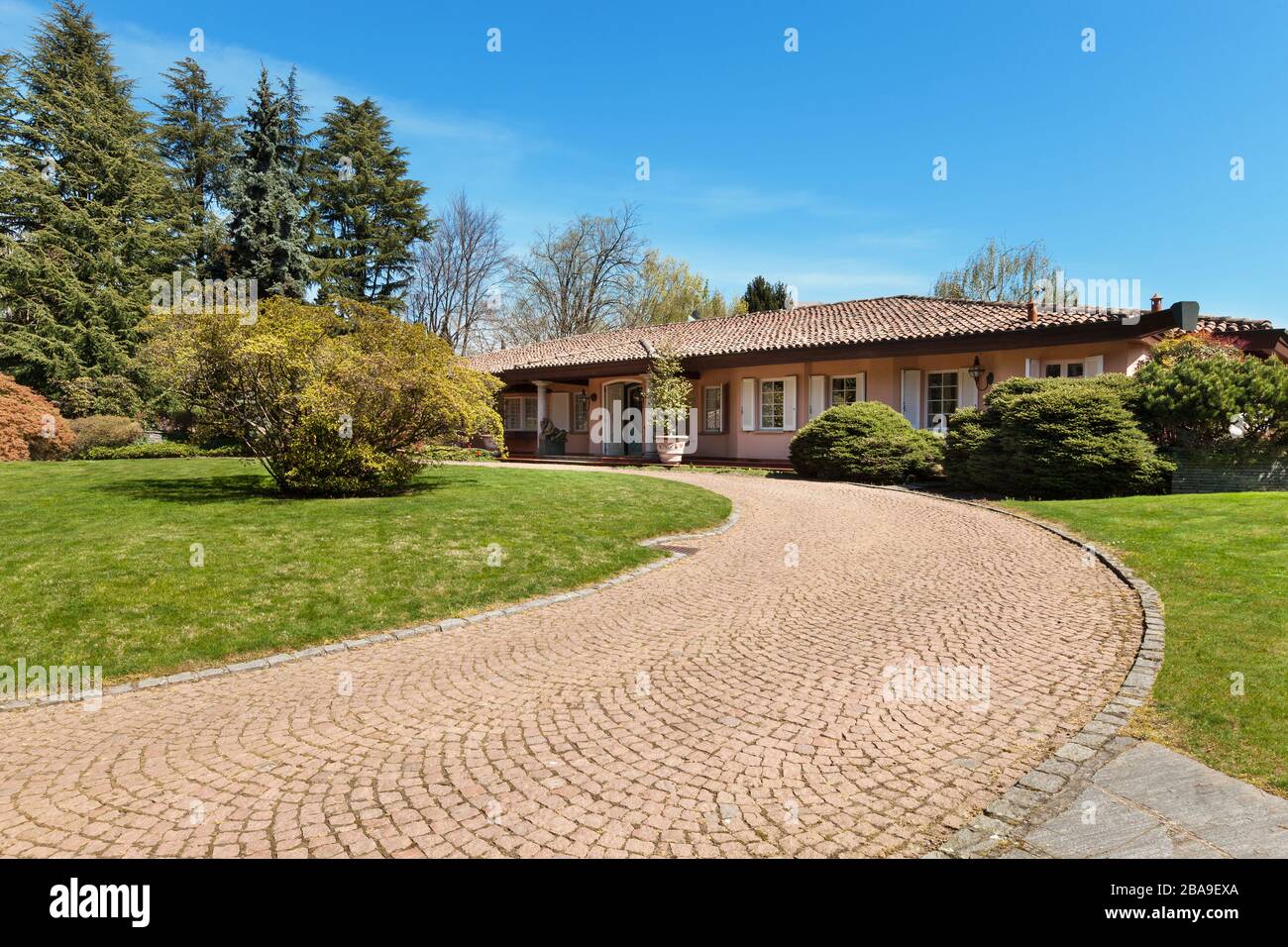 beautiful park of a villa, road, flooring stone Stock Photo - Alamy