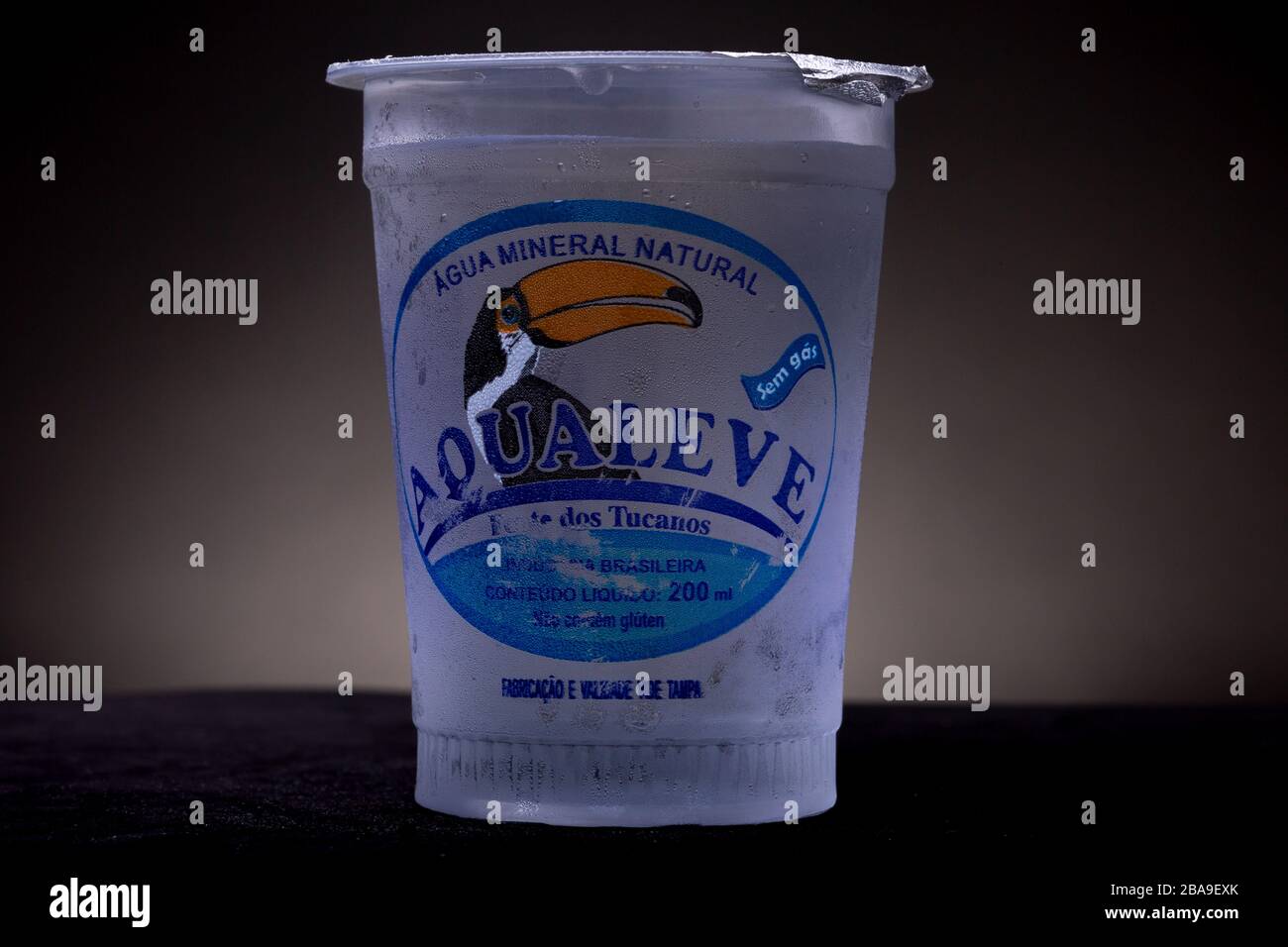 Self-contained single plastic cup of water as dispensable hydration ...