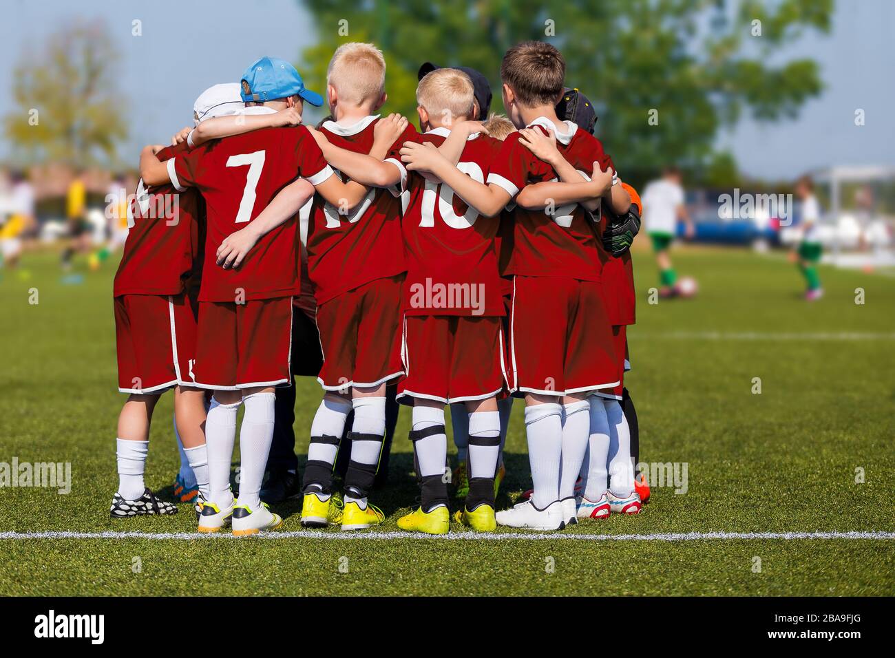 Boys in Sports Team on School Soccer Field. Children Doing Sports in ...