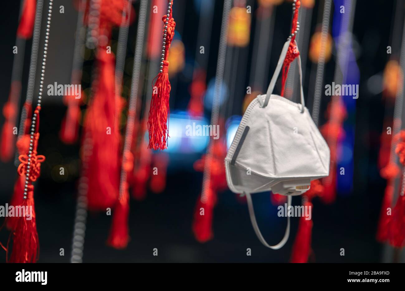 Hang the Chinese knot and N95 mask Stock Photo - Alamy