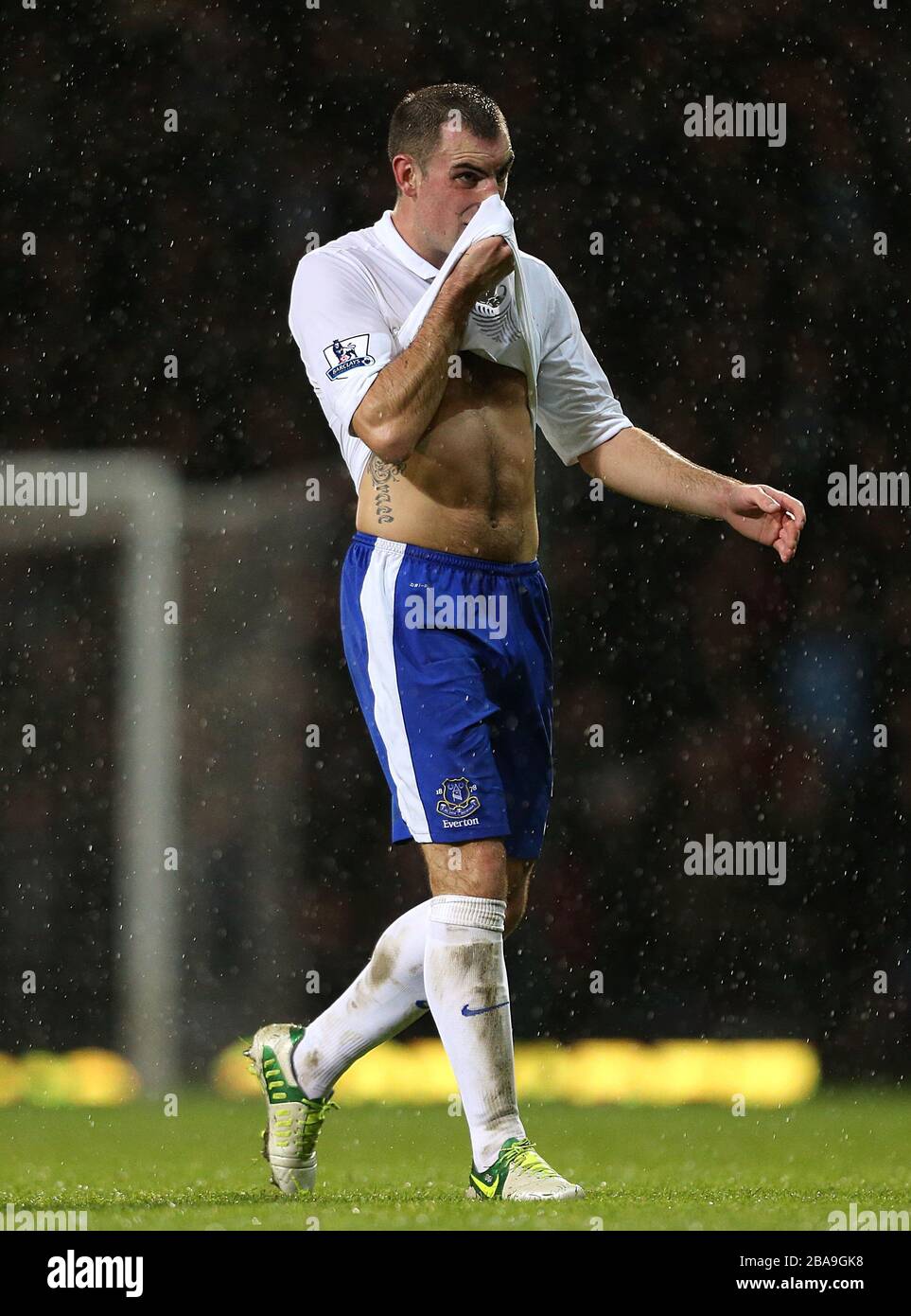 Everton's Darron Gibson leaves the field of play after being shown the ...