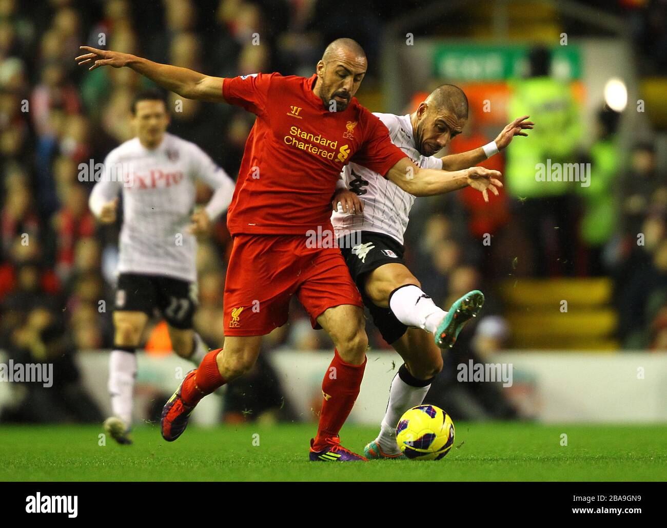 Fulham's Sanchez Jose Enrique (left) and Fulham's Ashkan Dejagah battle ...