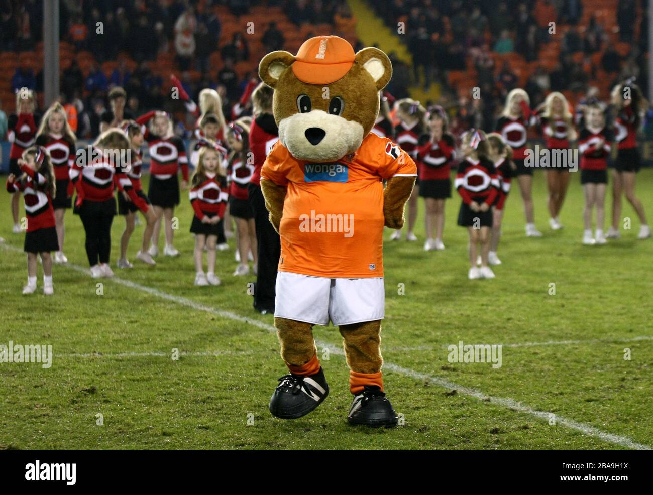 Blackpool's mascot Bloomfield Bear with cheerleaders before kick-off ...