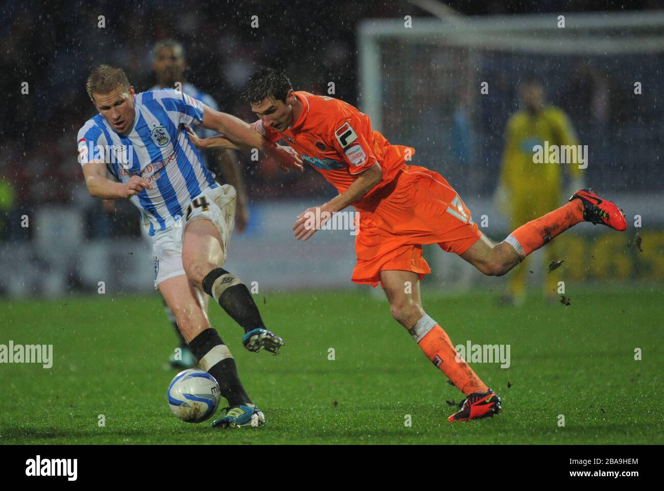 Huddersfield Town's Keith Southern and Blackpool's Chris Basham (right ...