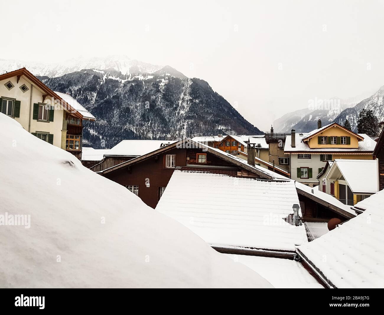 Snow-covered roofs in Interlaken Stock Photo - Alamy