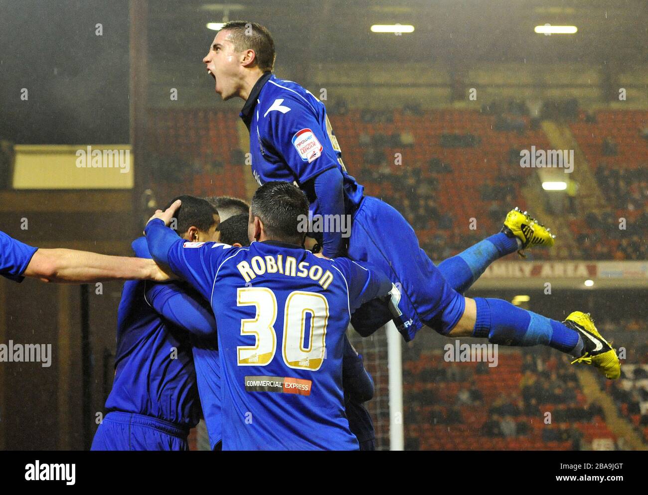 Birmingham City's Mitch Hancox (top) celebrates after Curtis Davies ...