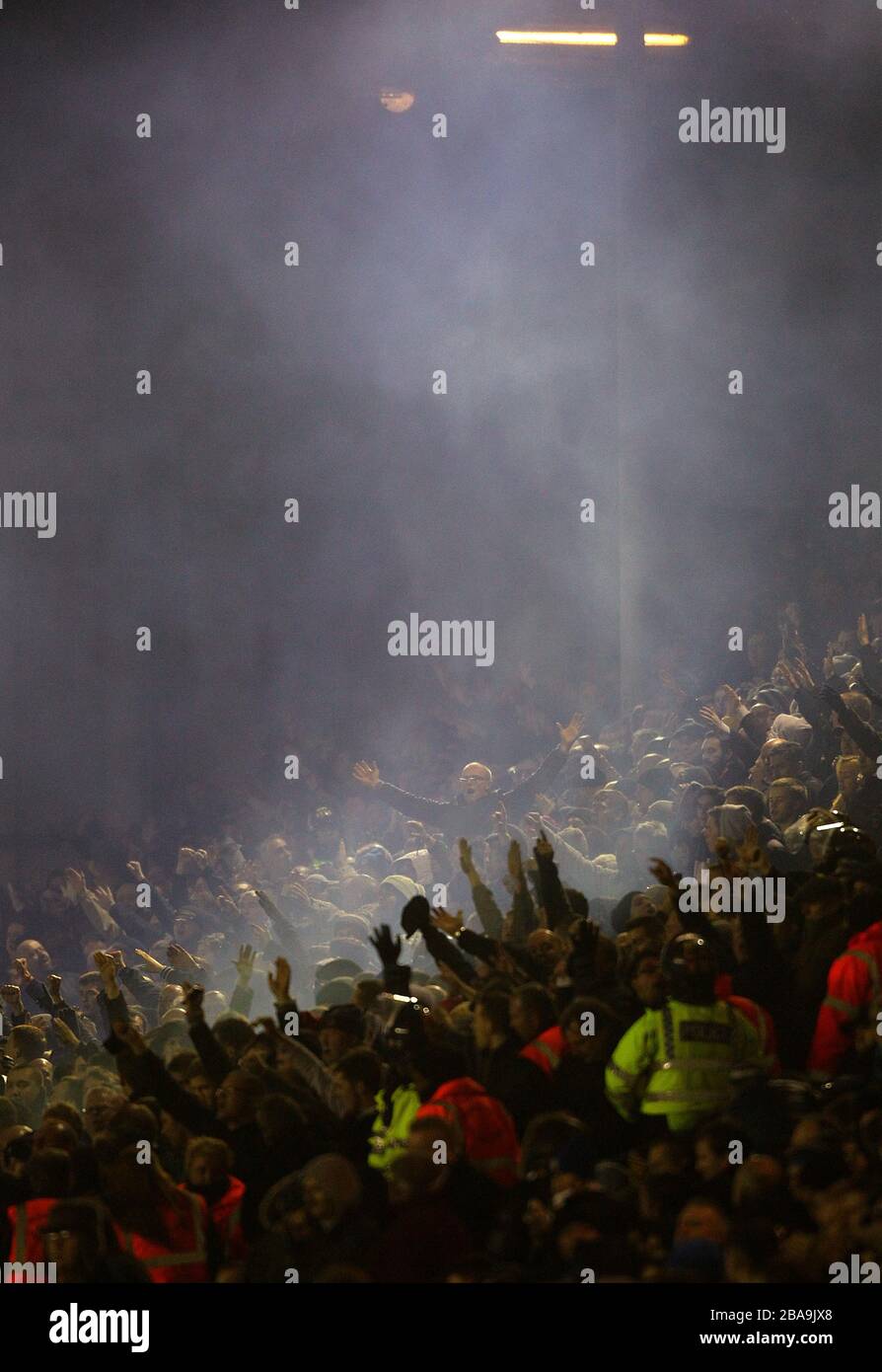 Chelsea fans let off a flare in the stands Stock Photo - Alamy