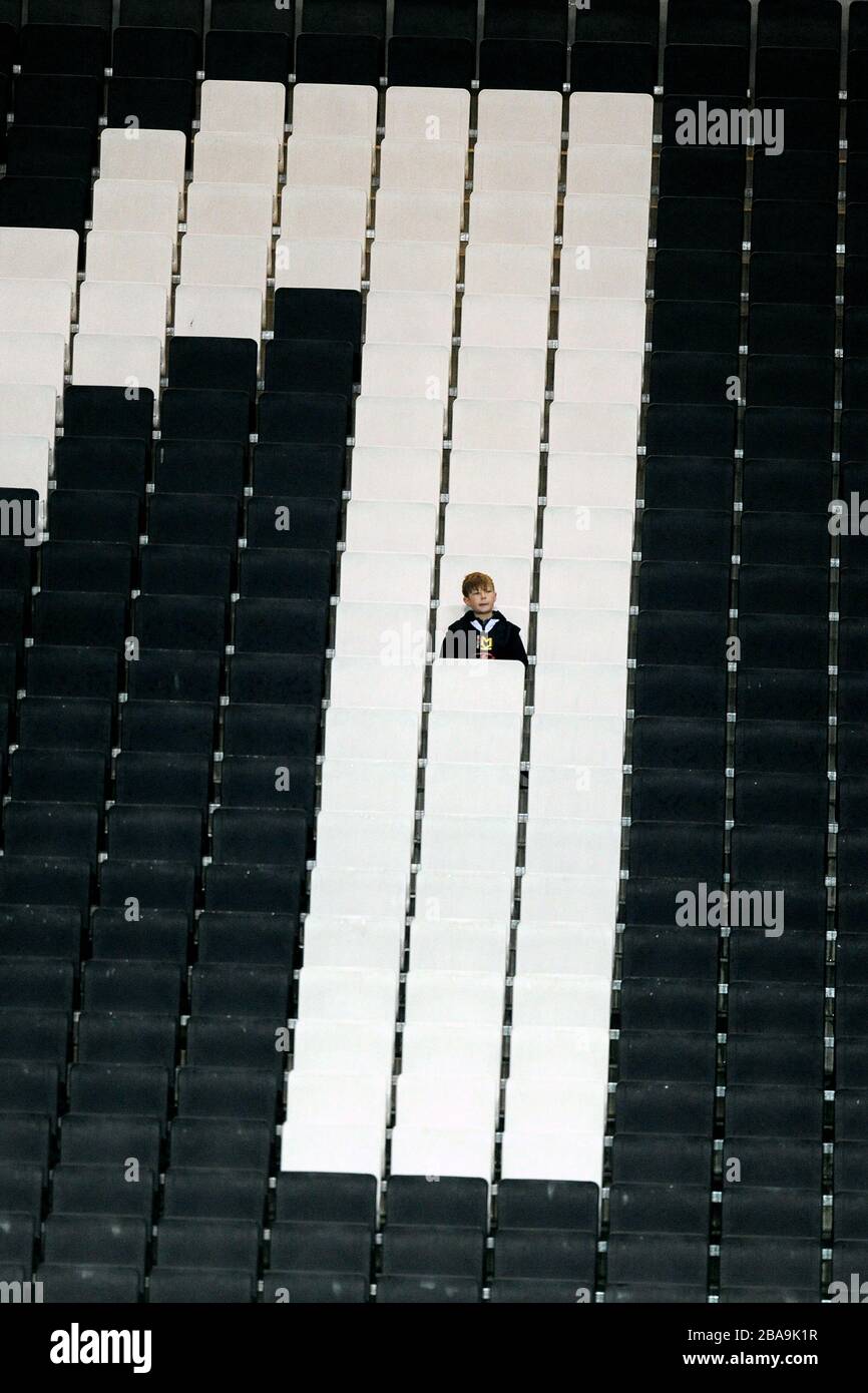 Lone fan stands stadium hi-res stock photography and images - Alamy