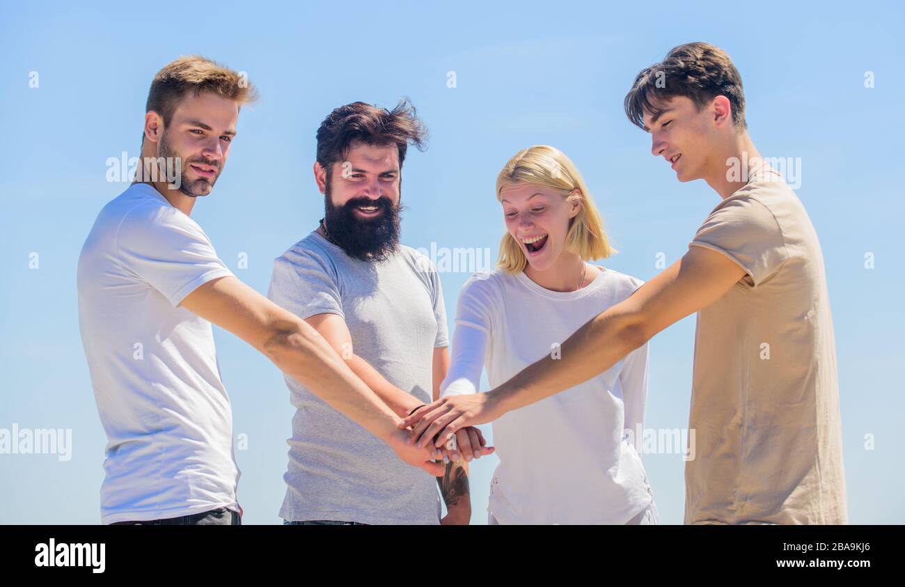 Dream team. Community member. Cheerful guys and girl. group of four ...