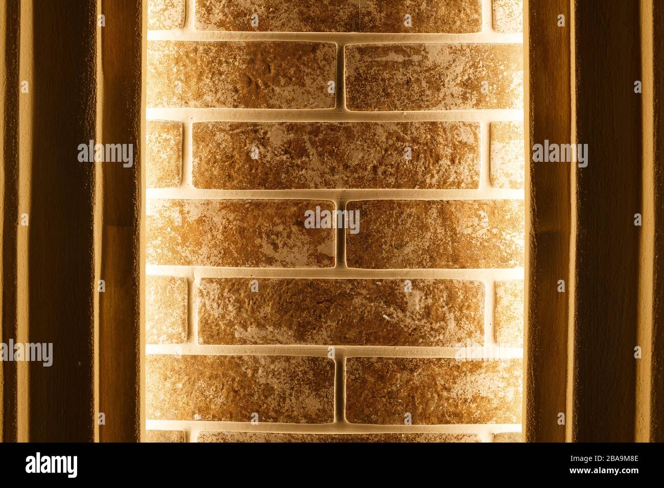 diode illumination of a decorative brick. Modern interior lighting ...