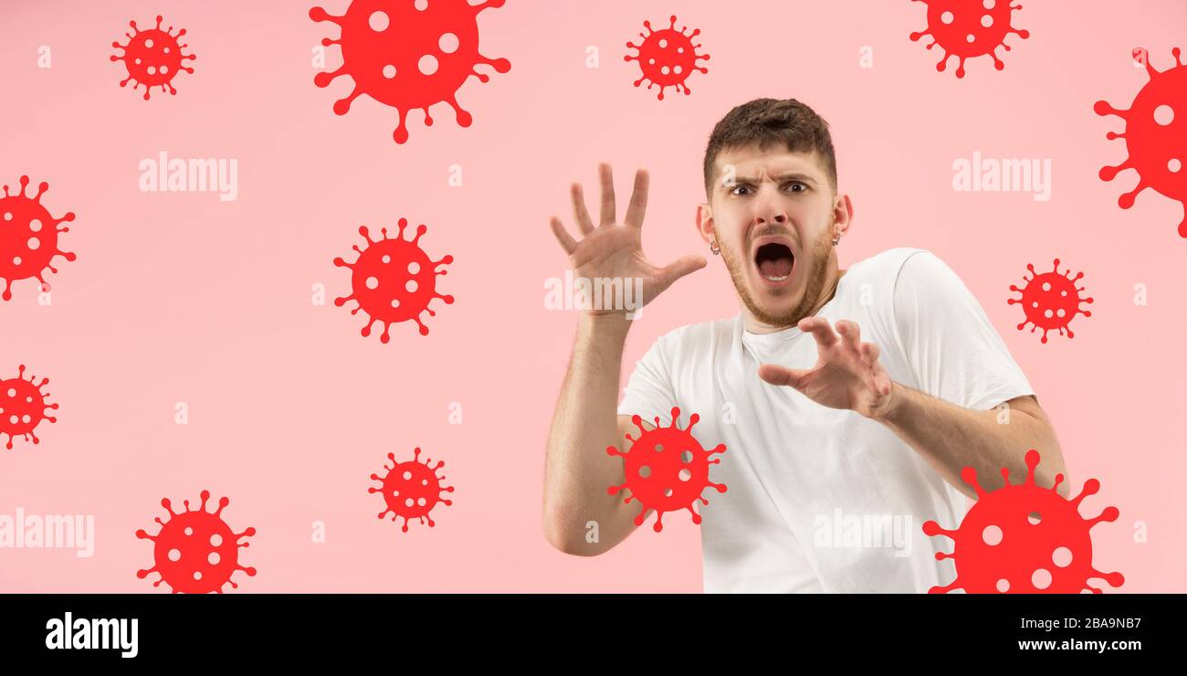 Young man scared of coronavirus spreading and worldwide cases, shocked ...
