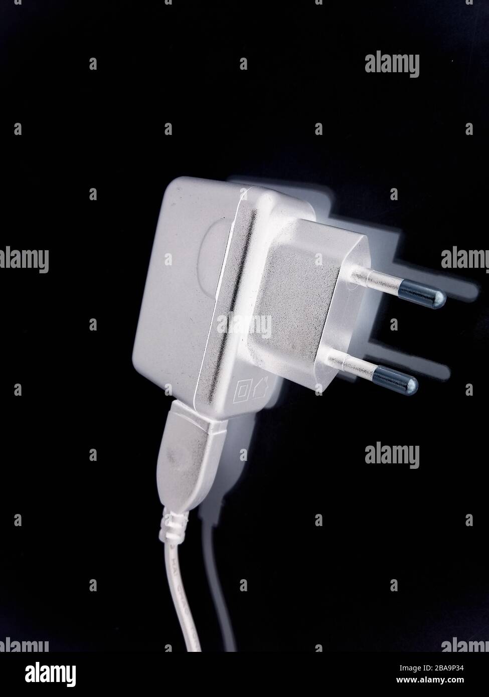 A picture of charging adapter Stock Photo - Alamy