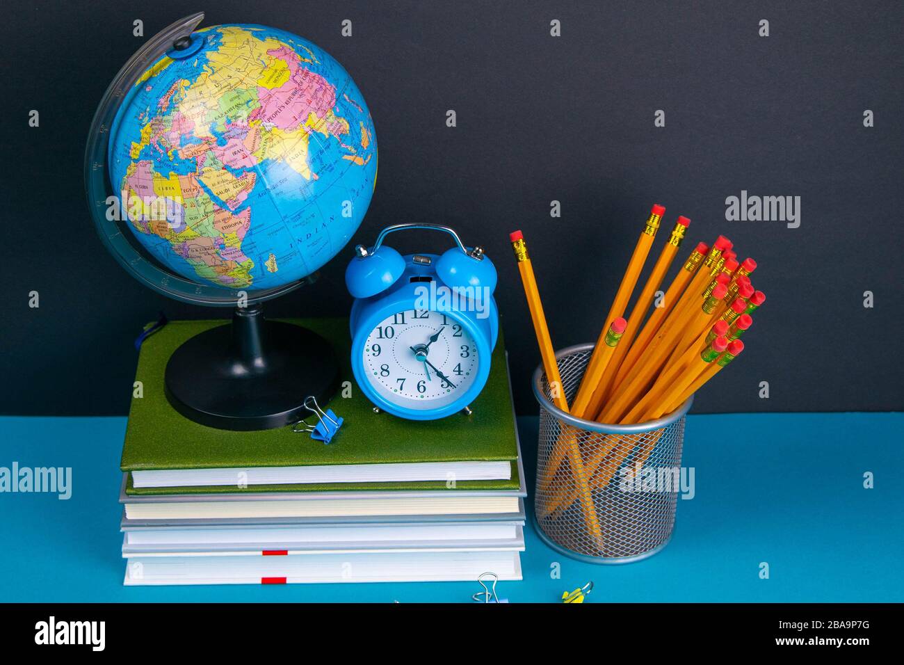 Globe Clock On Books High Resolution Stock Photography and Images - Alamy