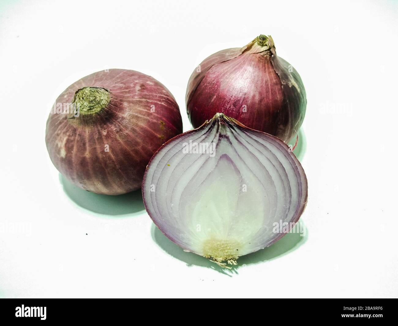 A picture of onions on white background Stock Photo - Alamy