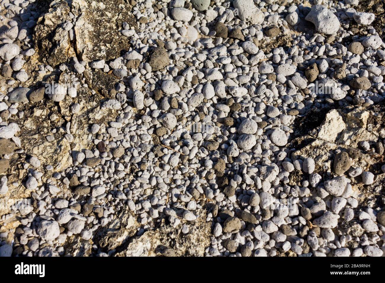Little stone surface as background texture Stock Photo - Alamy