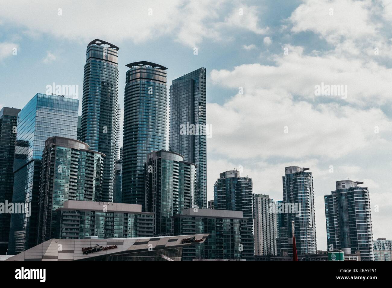 Modern tall buildings of Toronto, Ontario, Canada against blue sky ...
