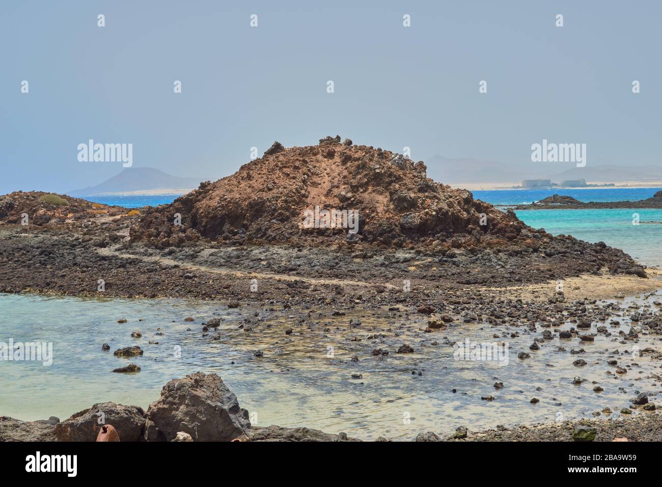 Nice little island with turquoise water in the small port of Isla de ...
