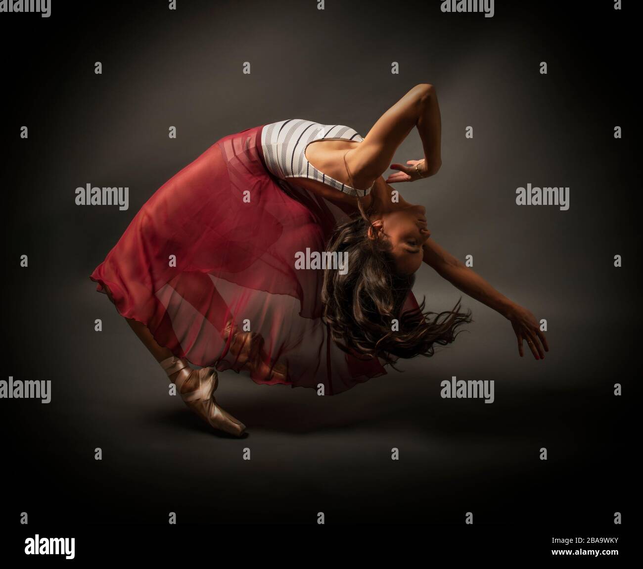 Ballerina. Young graceful woman ballet dancer, dressed in professional ...