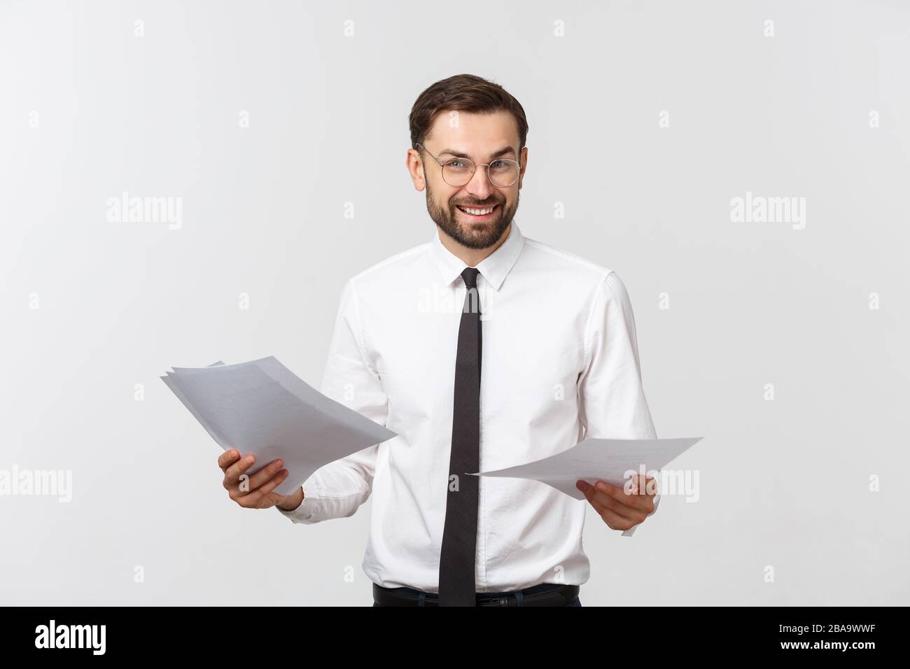 young business man serious writing on clipboard, Handsome businessman ...